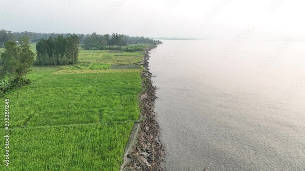 Soil erosion ditch around a running water, wild spring village river ...
