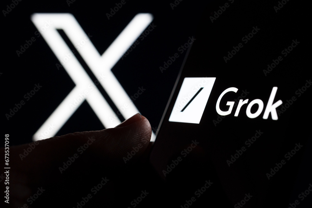 Grok AI chatbot logo seen on smartphone screen and finger pointing at ...