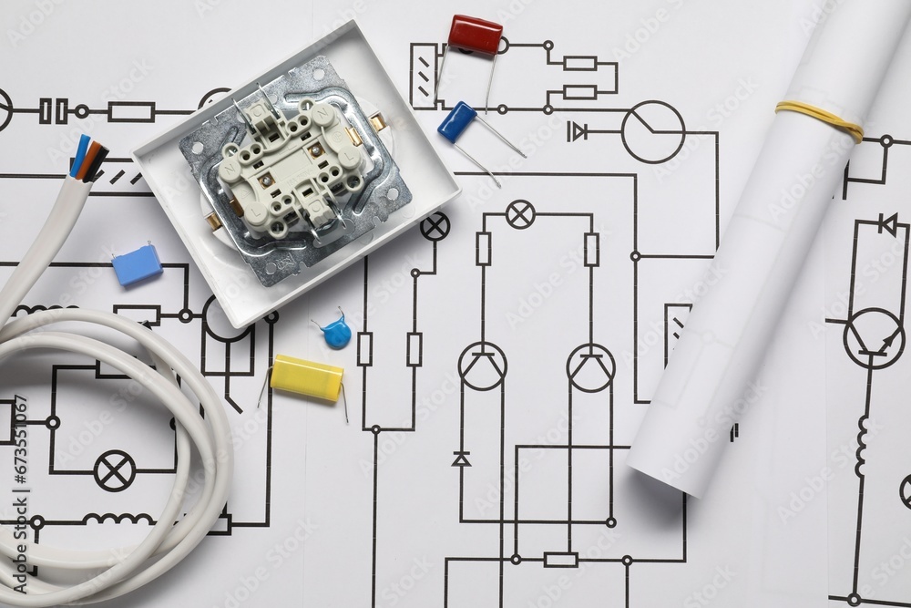 Wires and disassembled light switch on wiring diagrams, top view Stock ...