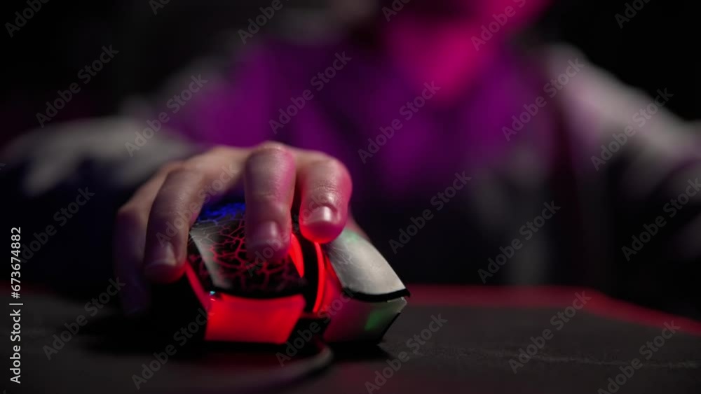 Close up shot of gamer clicking pc mouse button. Teenager boy plays ...