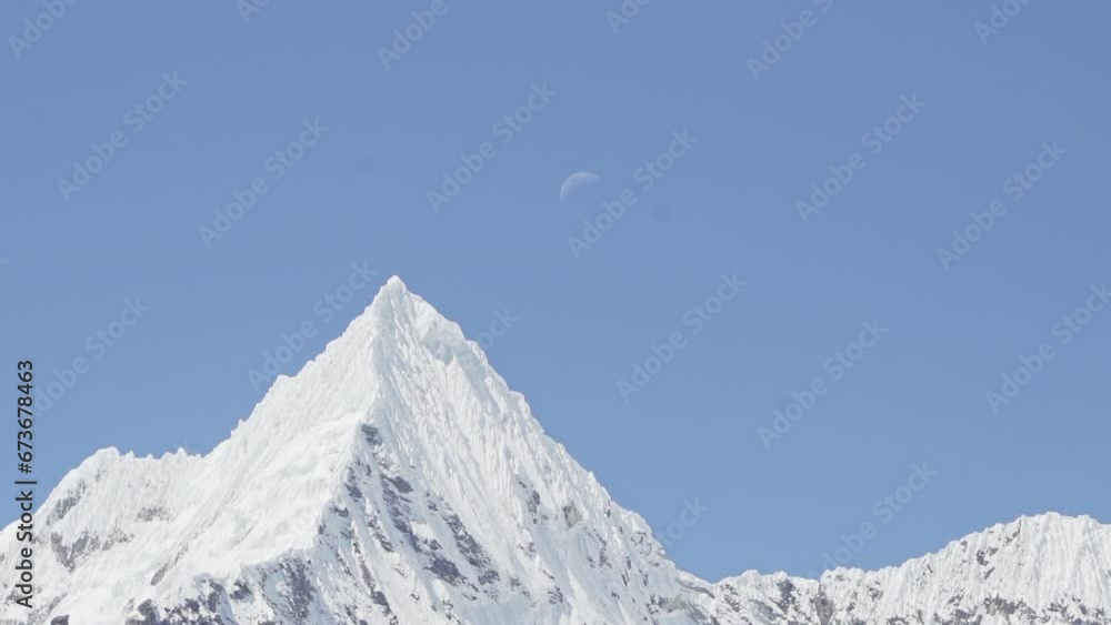 ice covered glacier of a pyramid shaped mountain at laguna paron lagoon ...