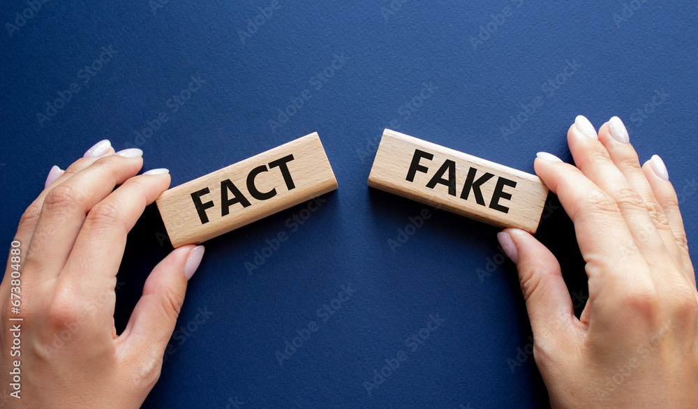 Fact or Fake symbol. Concept word Fact or Fake on wooden blocks ...