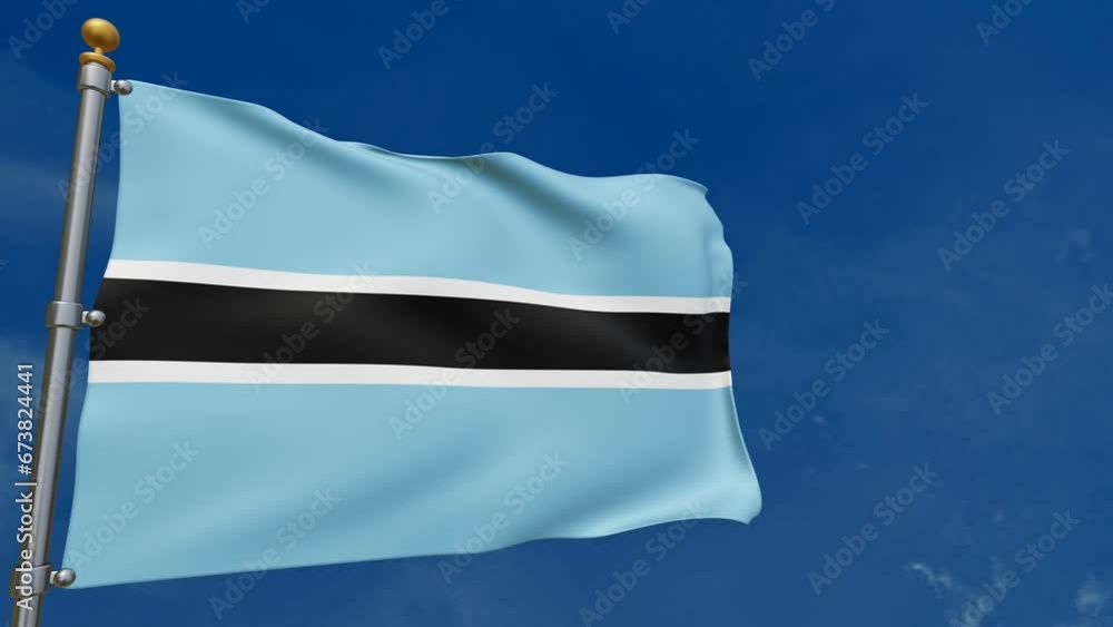 The national flag of Botswana fluttering in the wind against the blue ...