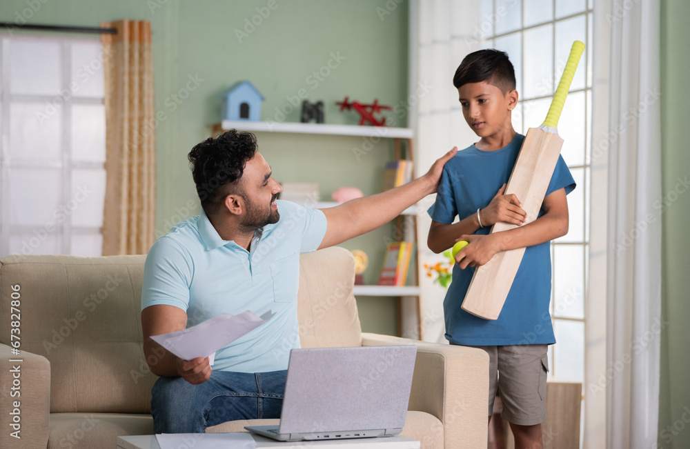 Son with bat and ball call his father for playing cricket game while ...