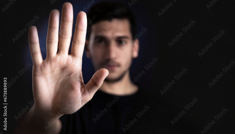 Human Rights Day Concept: Man with his hand extended signaling to stop ...