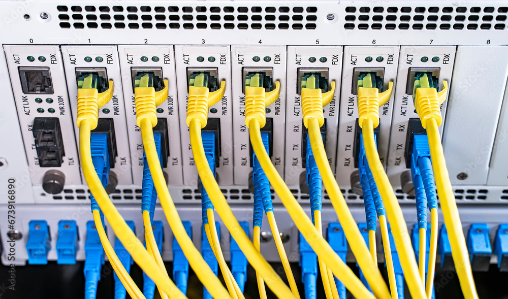 Poster Fiber Optical cables connected to an optic ports and Network ...