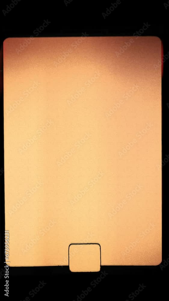 Vertical 4K film frame orange light leak and noise flickering ...