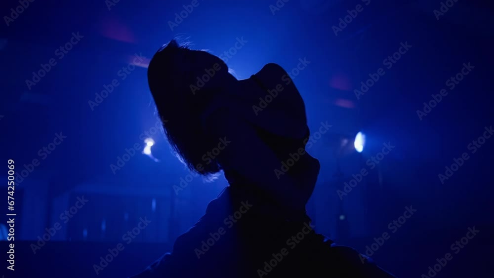 Young woman dancing elegant contemporary frame up strip on the floor in ...