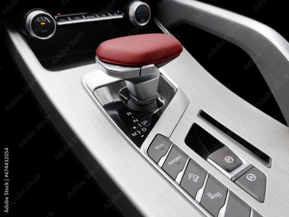 Automatic gear stick of a modern car. Modern car interior details ...