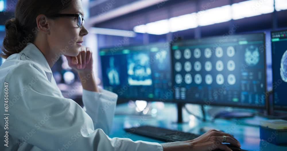 Hospital Research Laboratory: Female Medical Scientist Using Computer ...