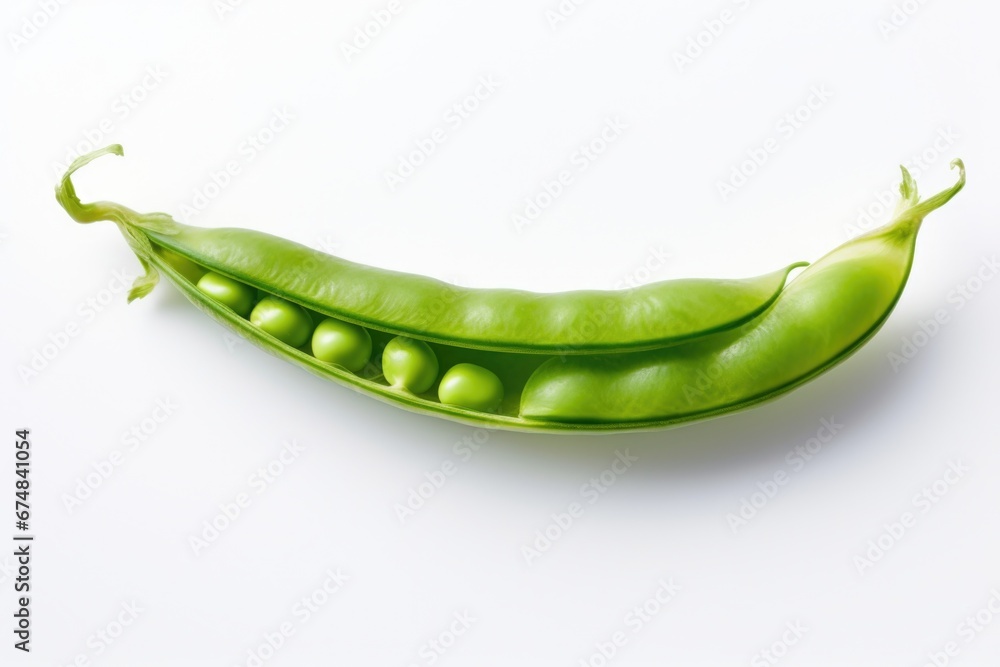 A close-up image of a single green pea on a clean white surface. This ...