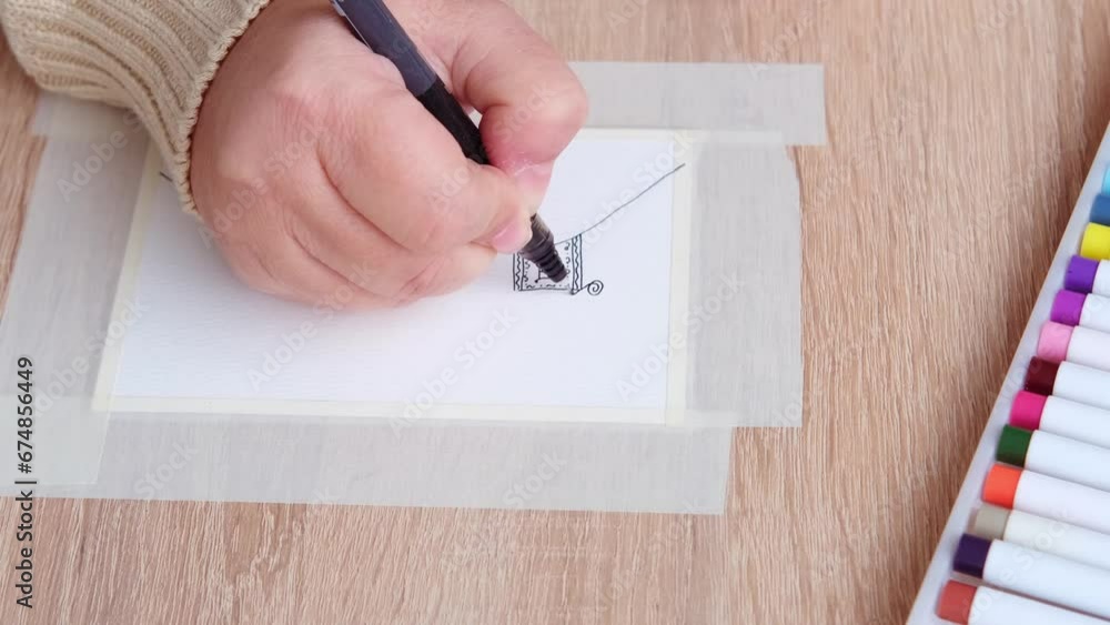 female hand drawing houses, mountains, trees, concept of sustainable ...