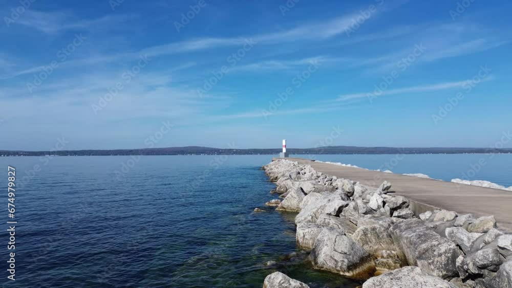 Petoskey lighthouse on Lake Michigan is a smaller beacon style ...
