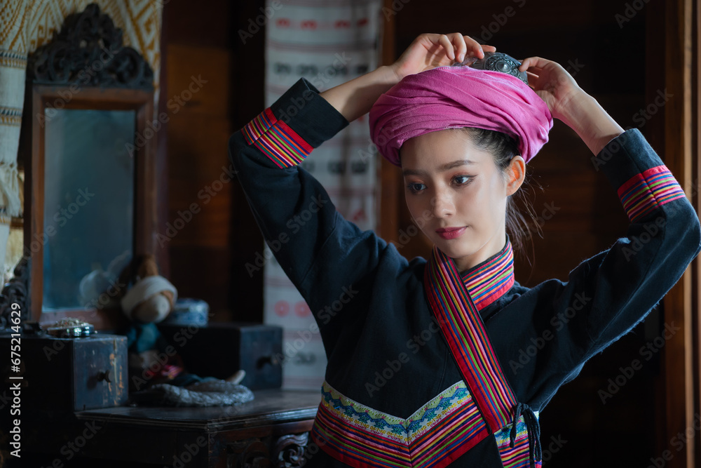 Pretty Asian Tai Lue women in beautiful traditional costumes doing ...