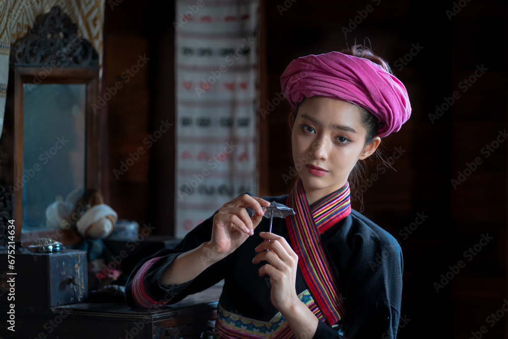 Pretty Asian Tai Lue women in beautiful traditional costumes doing ...