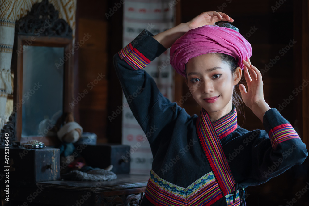 Pretty Asian Tai Lue women in beautiful traditional costumes doing ...