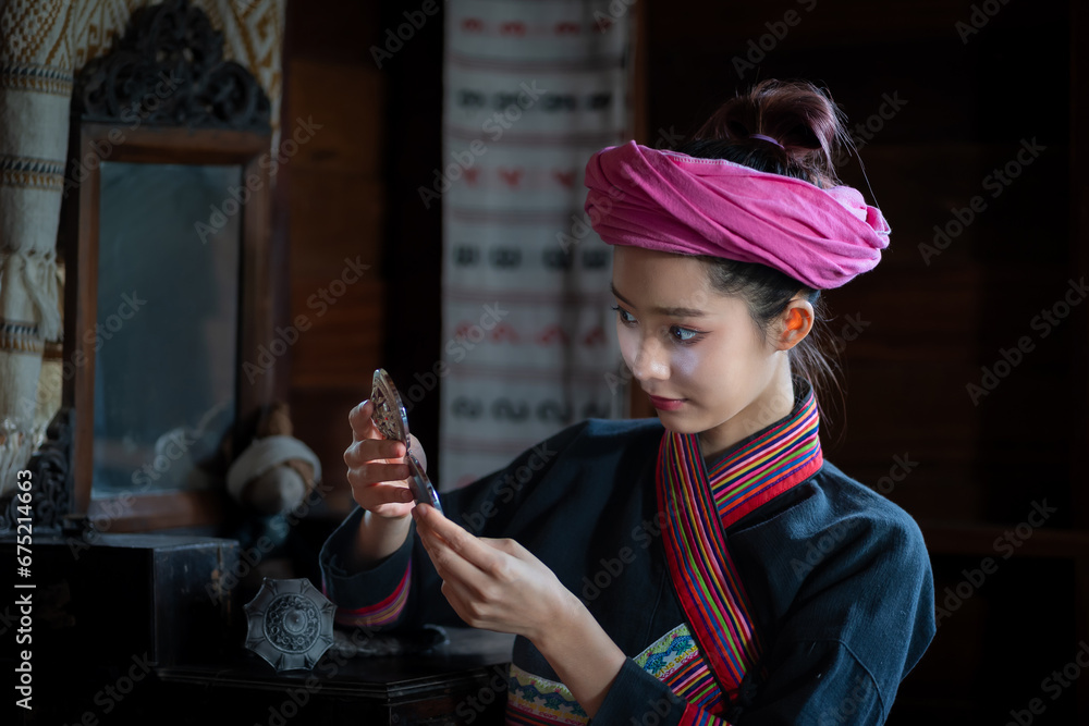 Pretty Asian Tai Lue women in beautiful traditional costumes doing ...
