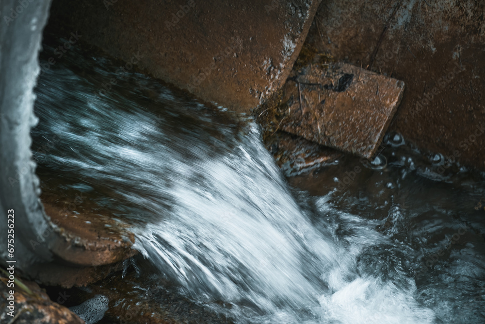 Draining sewage from a pipe into the river. Concept of pollution rivers ...