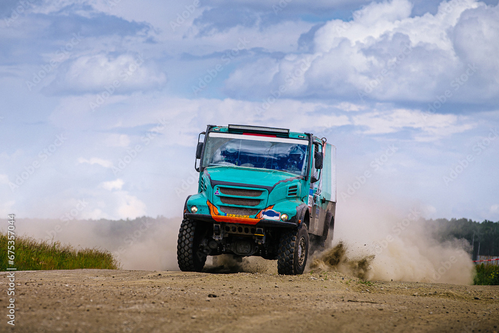 racing truck high speed moving on terrain road during cross country ...
