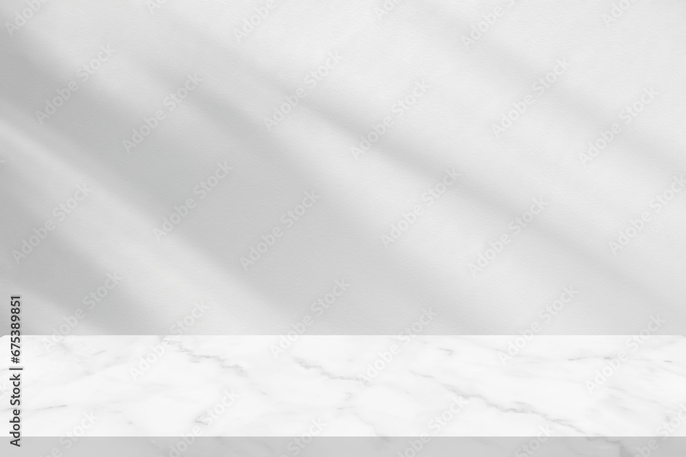 white mable table top or counter with blurry shadow on wall background ...