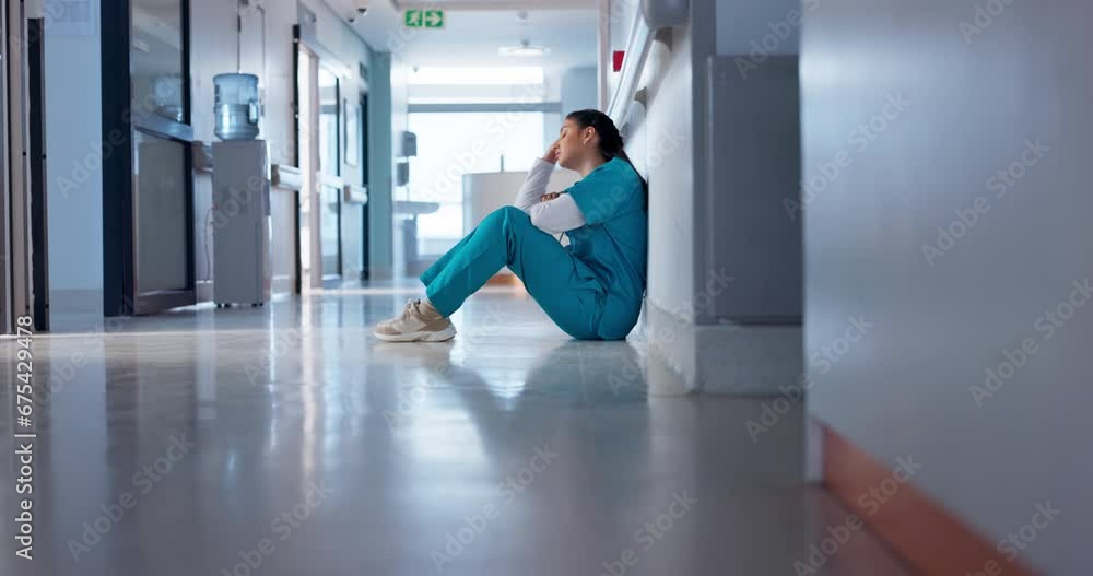 Nurse, stress and sad on floor for hospital mistake, healthcare fail or ...