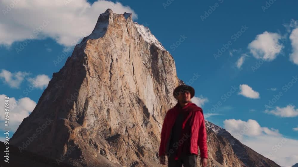 Defocused Indian male tourist walking in front of the Holy Gonbo ...