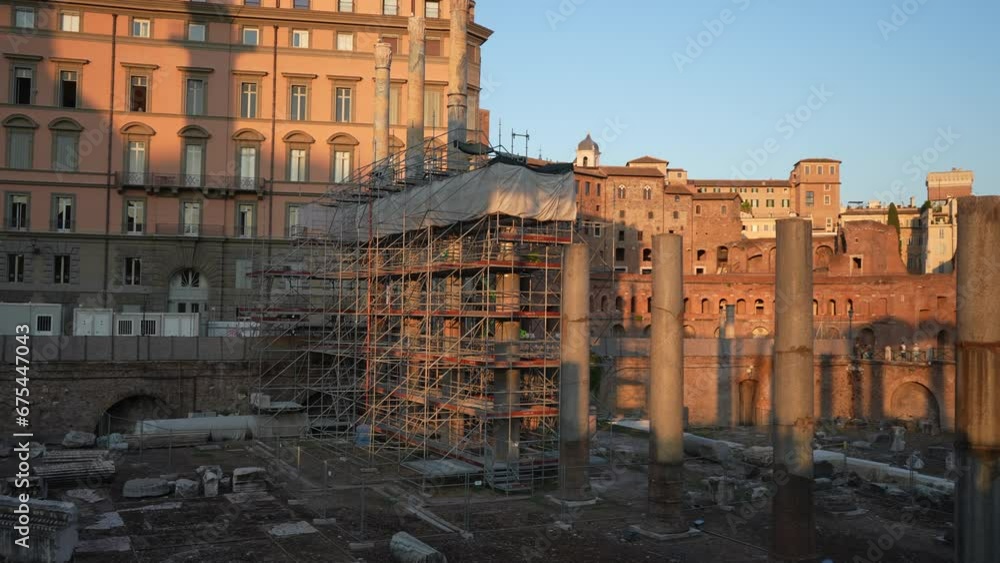 Restoration of ruins of Roman forum. Reconstruction of antique column ...