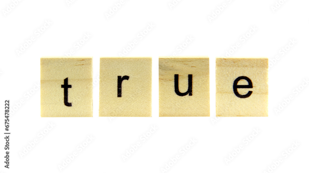 Short word english letter with text "true" on a small wooden cubes ...