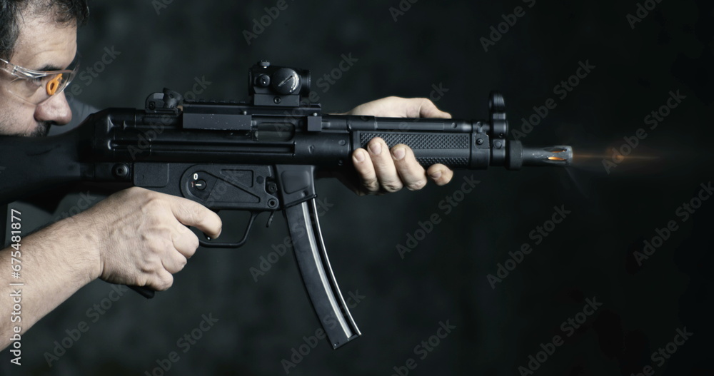 High-Speed Shooting with HK SP5K Assault Rifle, Side Perspective of ...