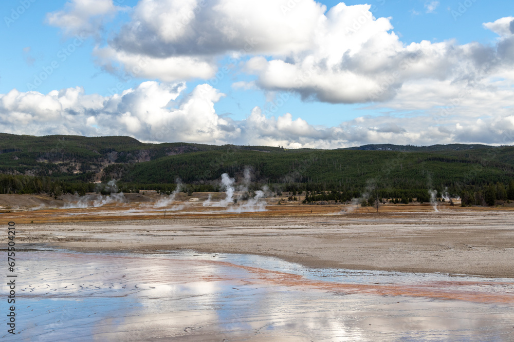 The Grand Prismatic Spring surrounding area on a cold cloudy winter day ...