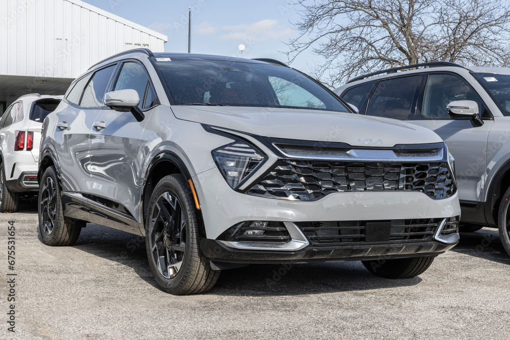 Kia Sportage display at a dealership. Kia offers the Sportage in LX, EX ...