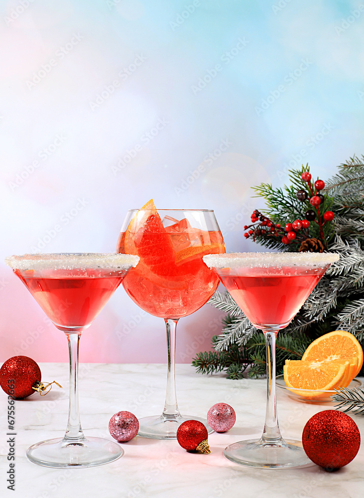 Christmas alcoholic cocktail Aperol spritz and red Martini in glasses ...