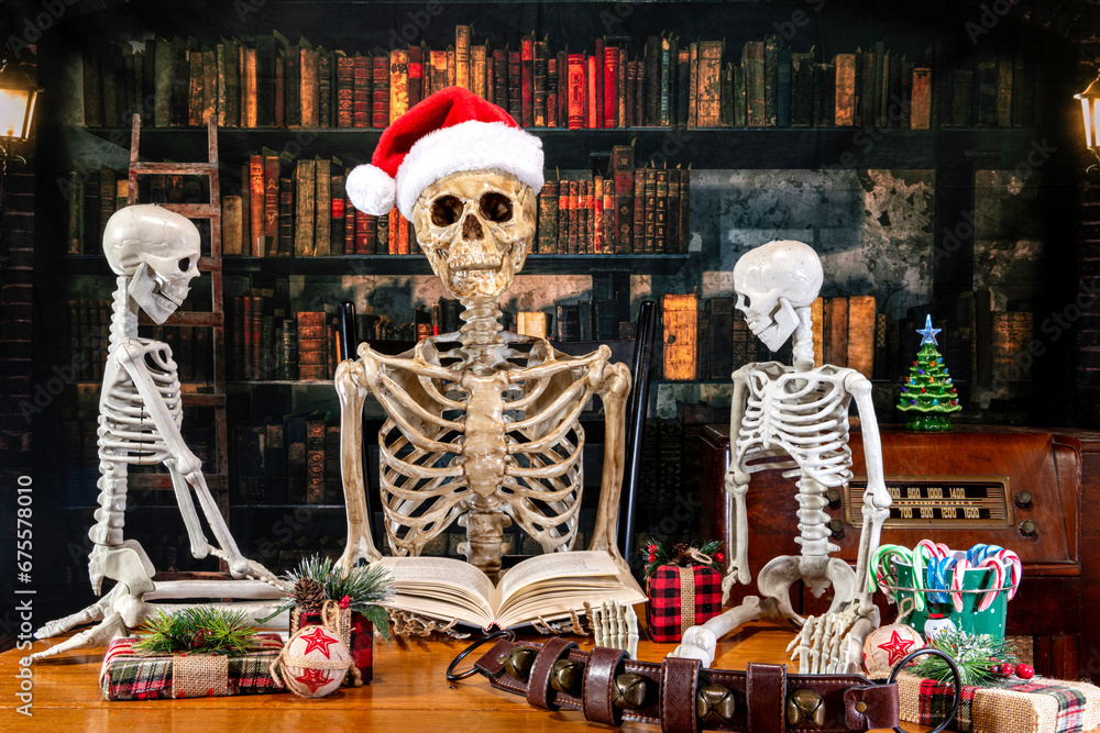 Dad skeleton reading to children skeletons on Christmas eve in old ...