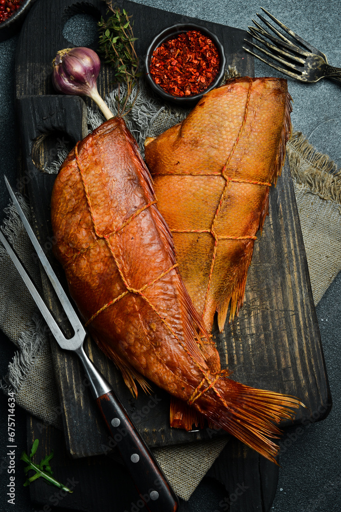 Smoked fish red sea bass. Sea bass closeup. Delicious seafood for ...