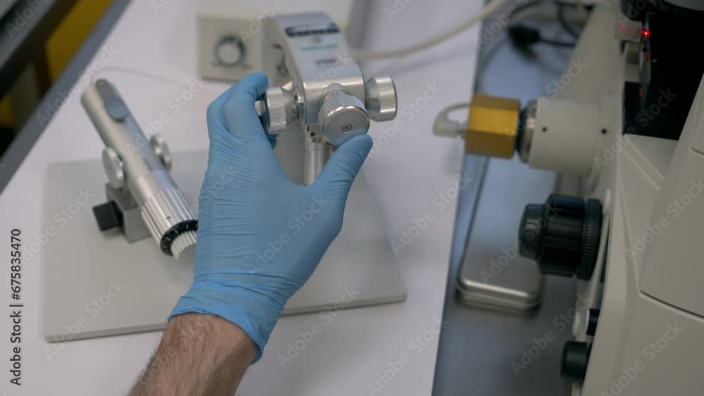 Setting up the laboratory microscope tool for examination of human egg ...