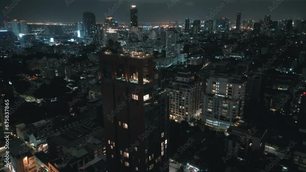 Night big city captured by drone. Aerial view of night city with modern ...