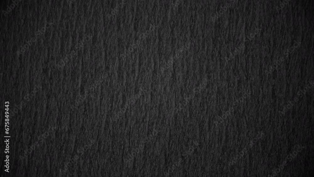 Black crumpled texture surface seamless loop rotating. Used as a ...