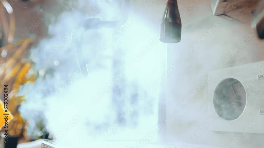 Steam wand on a espresso machine. Hot steam flow. Modern coffee machine ...