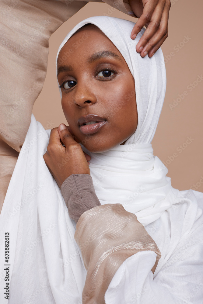 Studio portrait of young woman wearing white hijab Stock Photo | Adobe ...