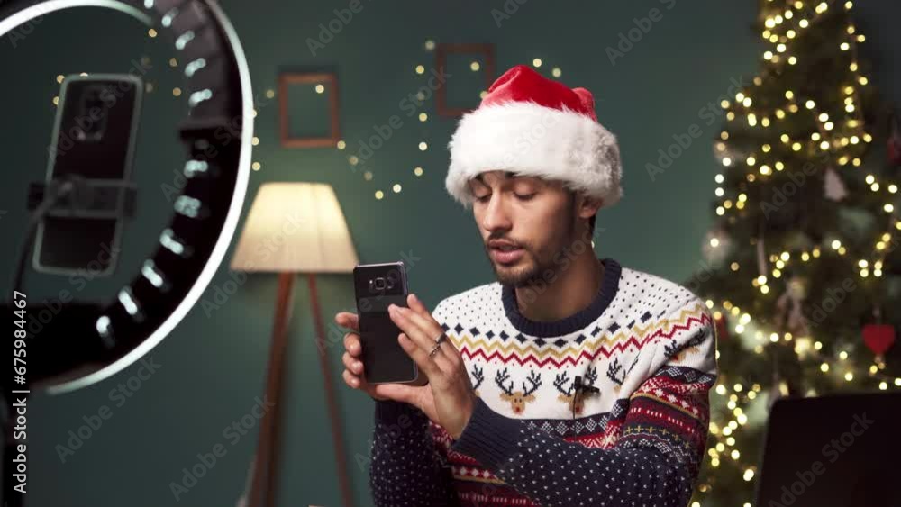 Tech vlogger doing unpacking review video of mobile phone while ...