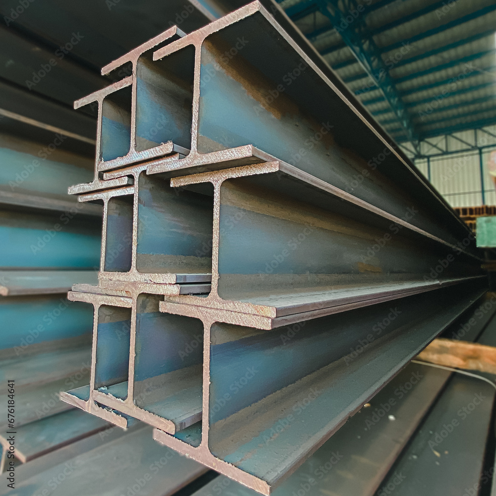 Steel beams production. Metal girders stack on project construction ...