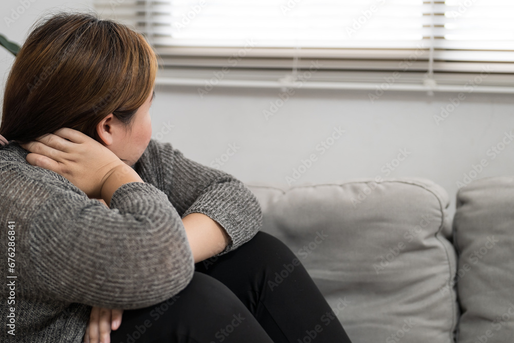 Sad Overweight plus size woman thinking about problems on sofa upset ...