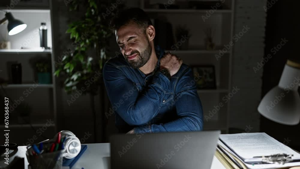 Overworked and stressed, young hispanic business worker battles ...