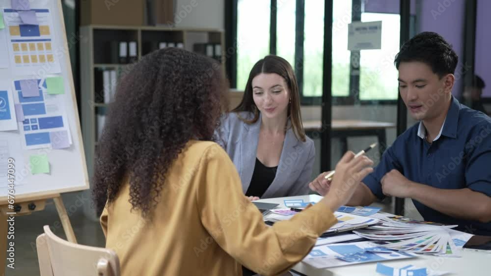 ux developers and ui designers brainstorm prototype layouts for mobile ...