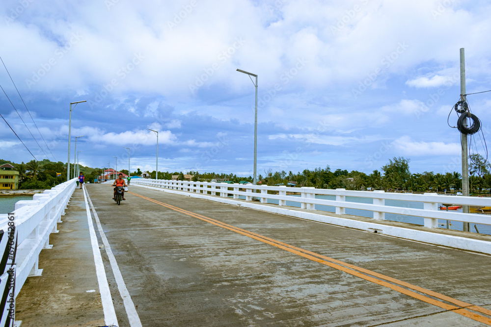 Crossing the bridge in a small town. Magdiwang, Romblon, Philippines ...