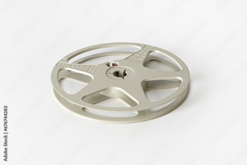 Empty reel to reel tape recorder or 8mm film reel. Cassette of a ...