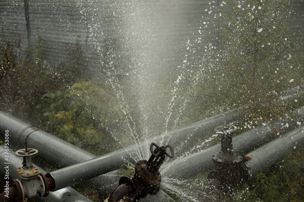 Pipe accident. Water breakthrough. Hot water flow. Damage to pipeline ...