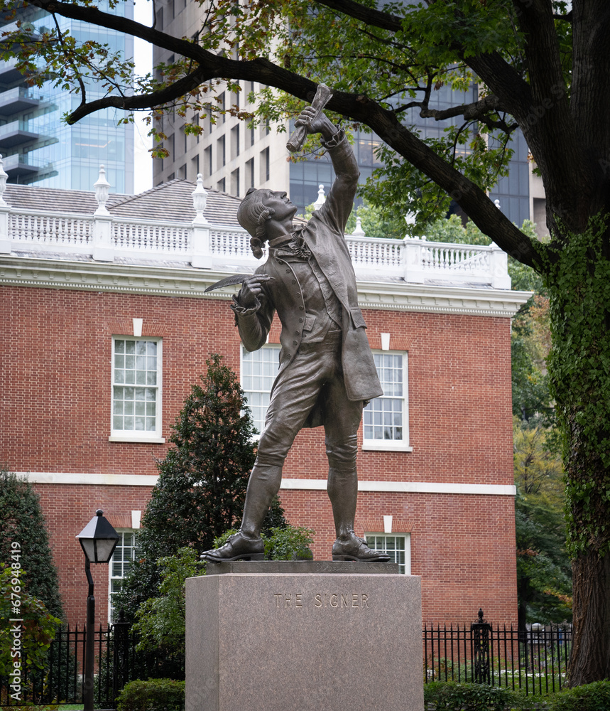 Philadelphia, PA – US – Oct 13, 2023 The bronze statue of “The Signer ...