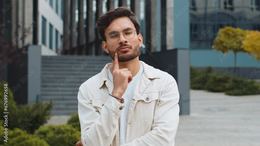 What. Why. Surprised frustrated Indian man raising hands asking reason ...