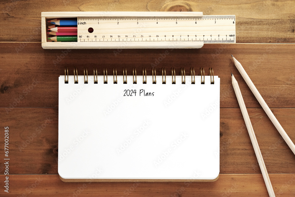 2024 plans on blank notebook paper on white background, 2024 new year ...